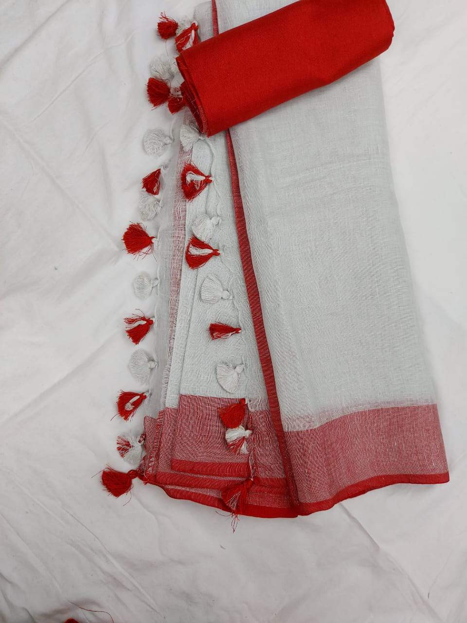 White and Red Pure Linen Saree - Elegant Traditional Attire.